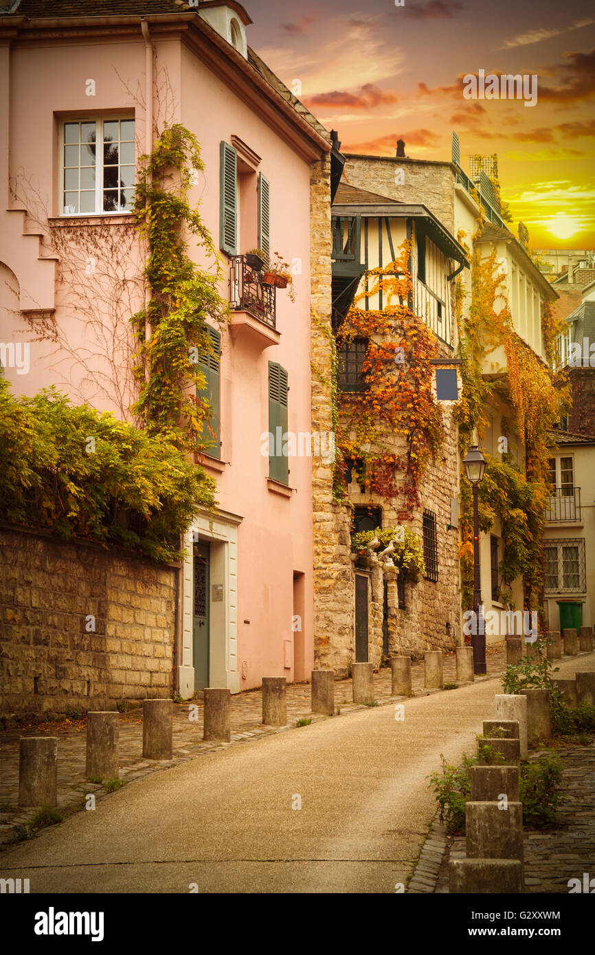 Montmartre, France. Street with houses. Sunset in Paris Stock Photo - Alamy