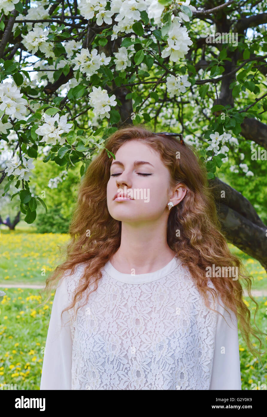 Spring tree girl hi-res stock photography and images - Alamy