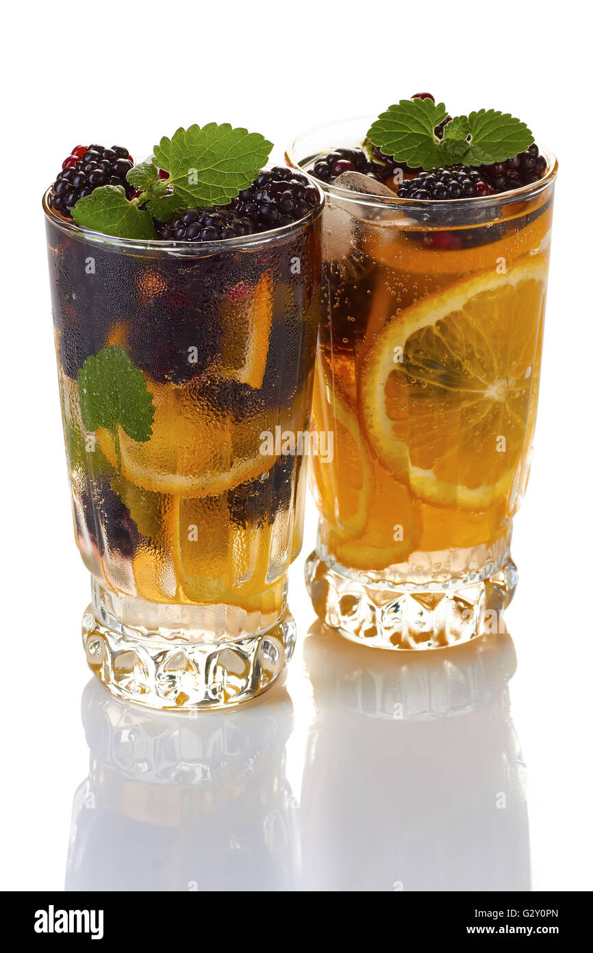 Two refreshing fruit drinks on white Stock Photo - Alamy