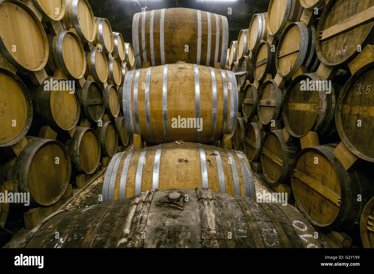 Inside the cellar of a cognac distillery in the Charente region of ...