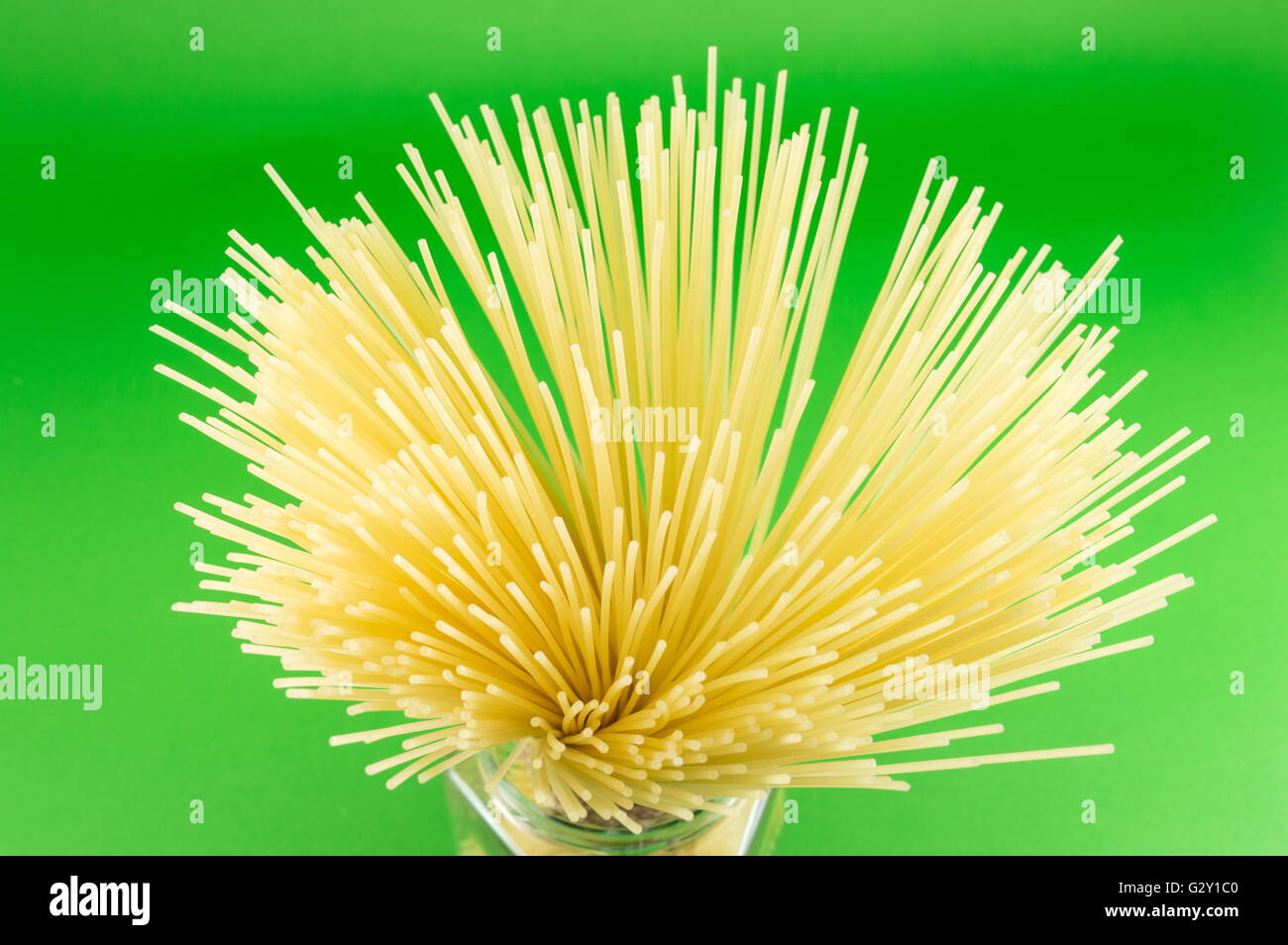 Raw spaghetti in spiral shape ready for cooking Stock Photo - Alamy