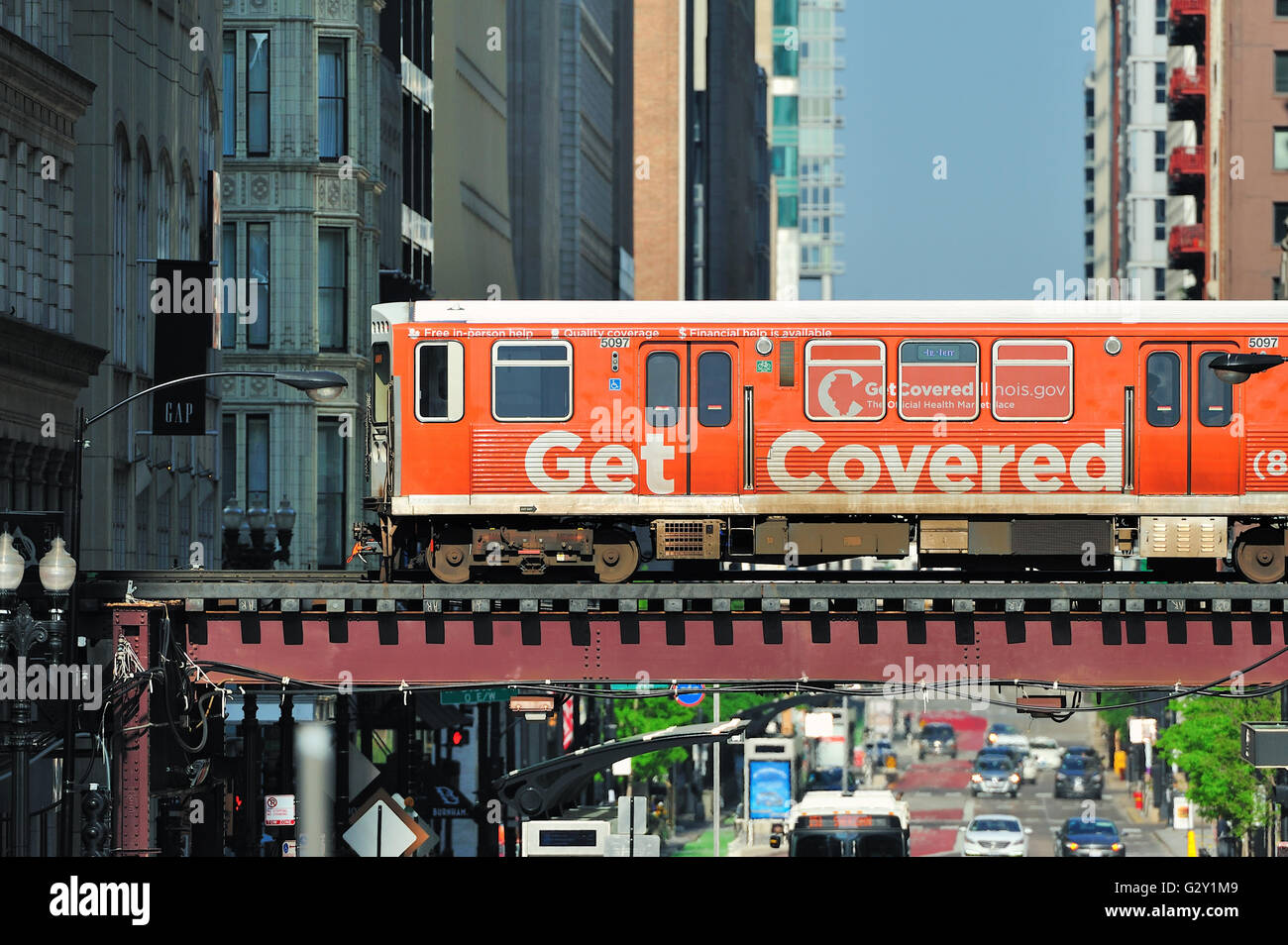 A CTA Green Line rapid transit train on elevated tracks above Wabash ...