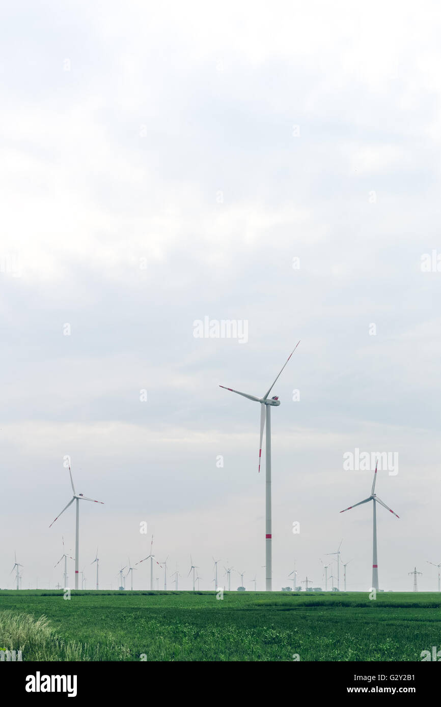Wind turbines of windmills generating electricity Stock Photo - Alamy
