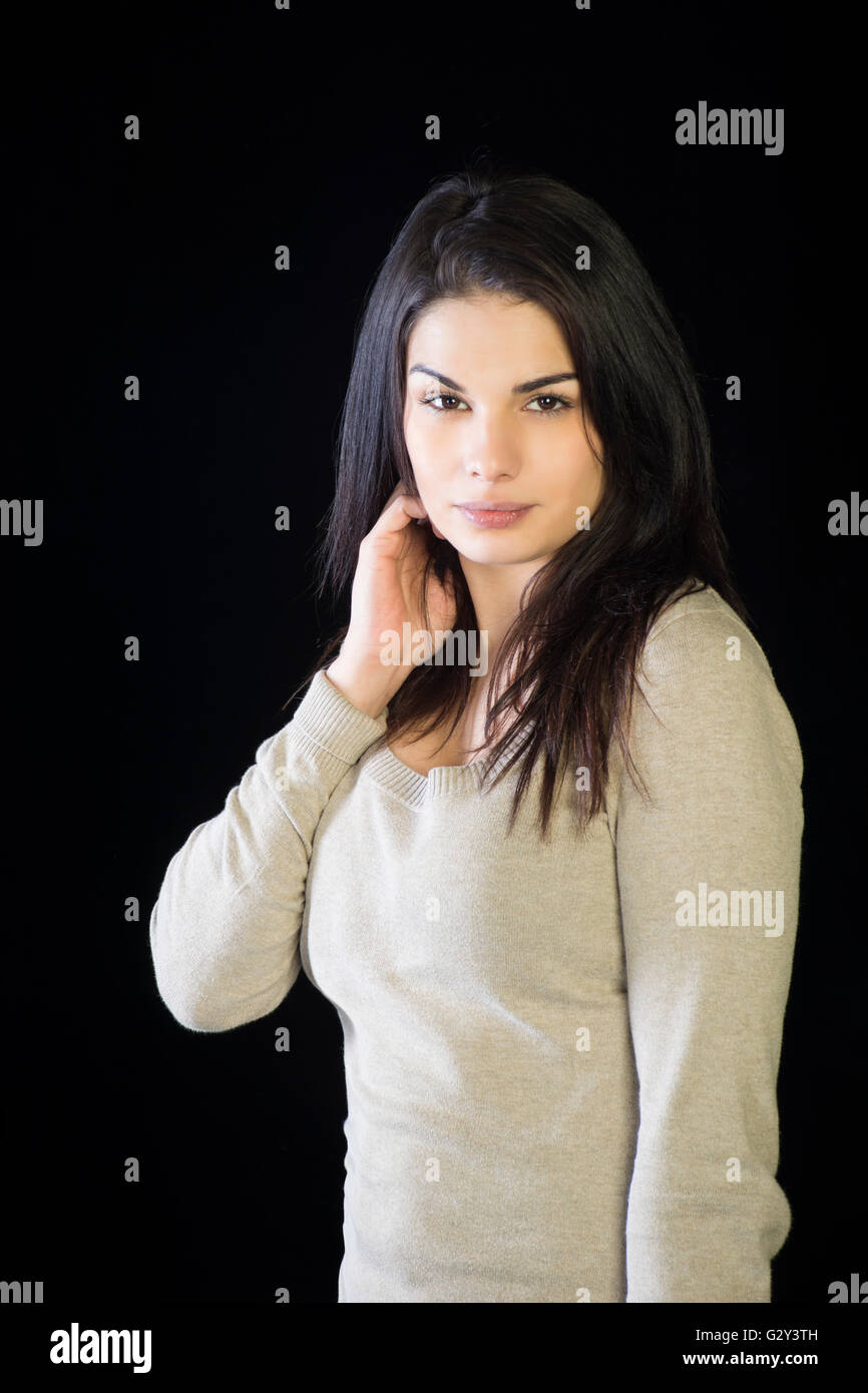 Beautiful young woman hand on neck Stock Photo - Alamy