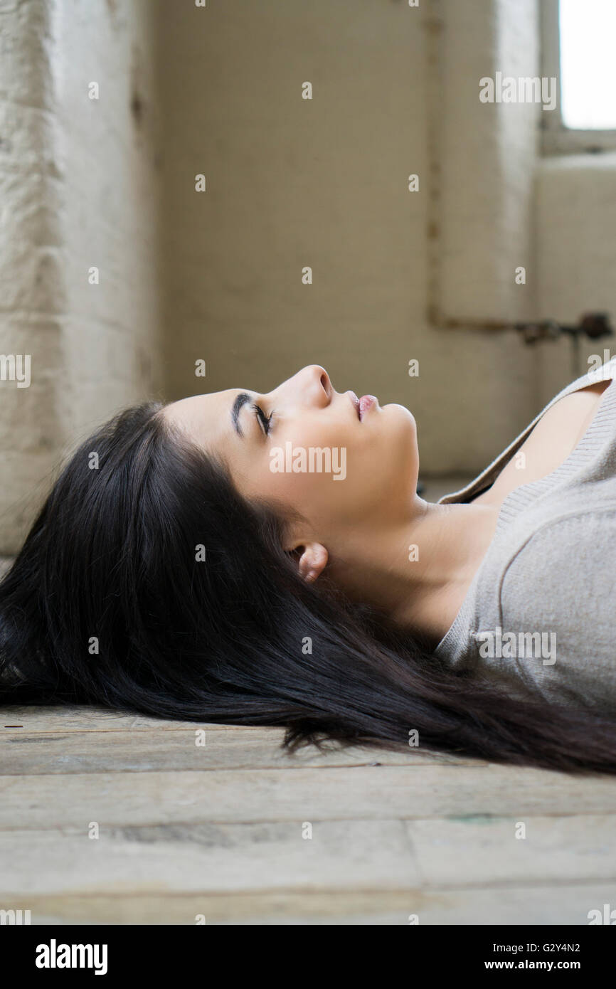 Beautiful woman laying on side hi-res stock photography and images - Alamy