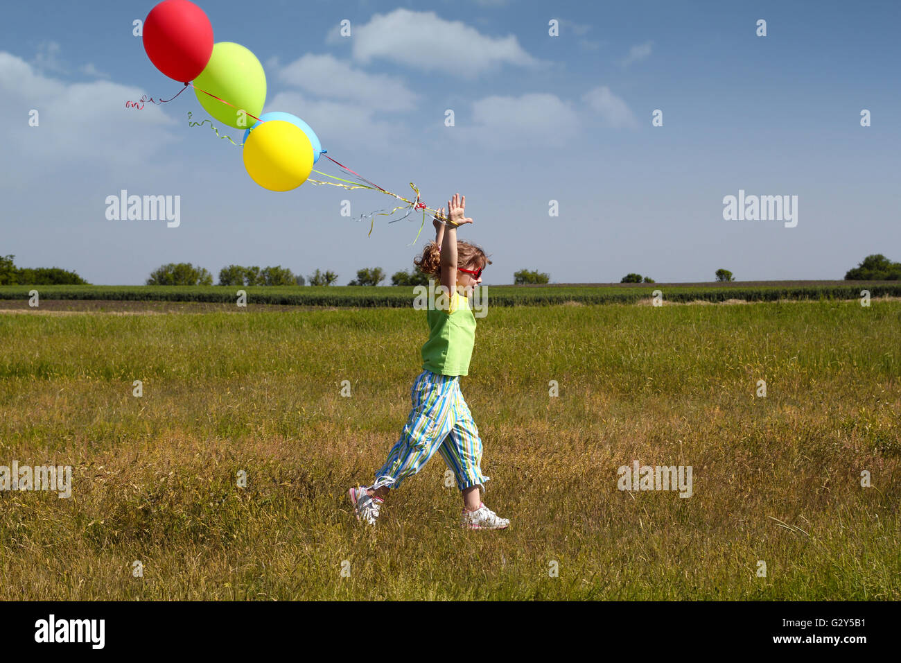 Balloon running hi-res stock photography and images - Alamy