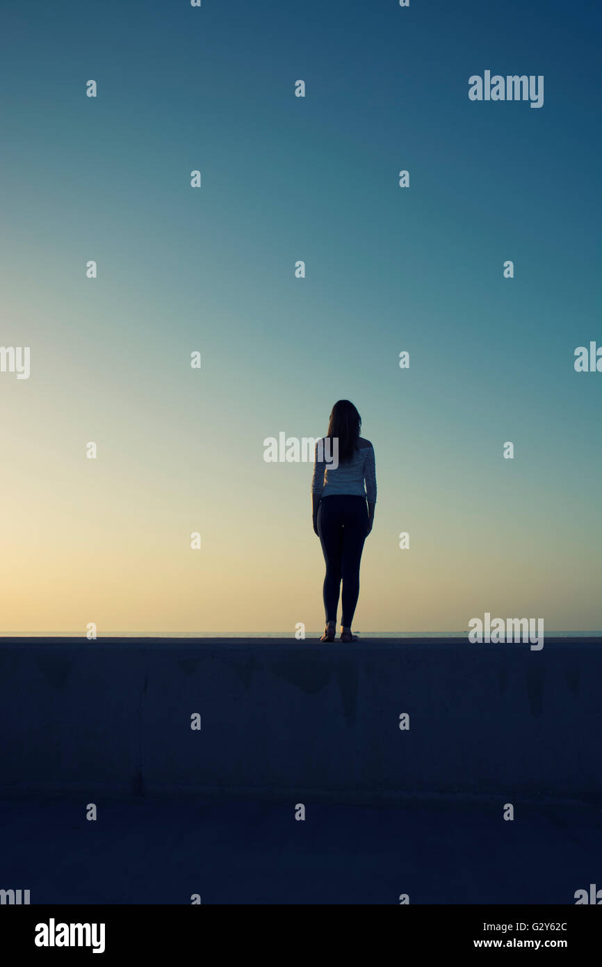 Full length female figure standing outdoors Stock Photo - Alamy