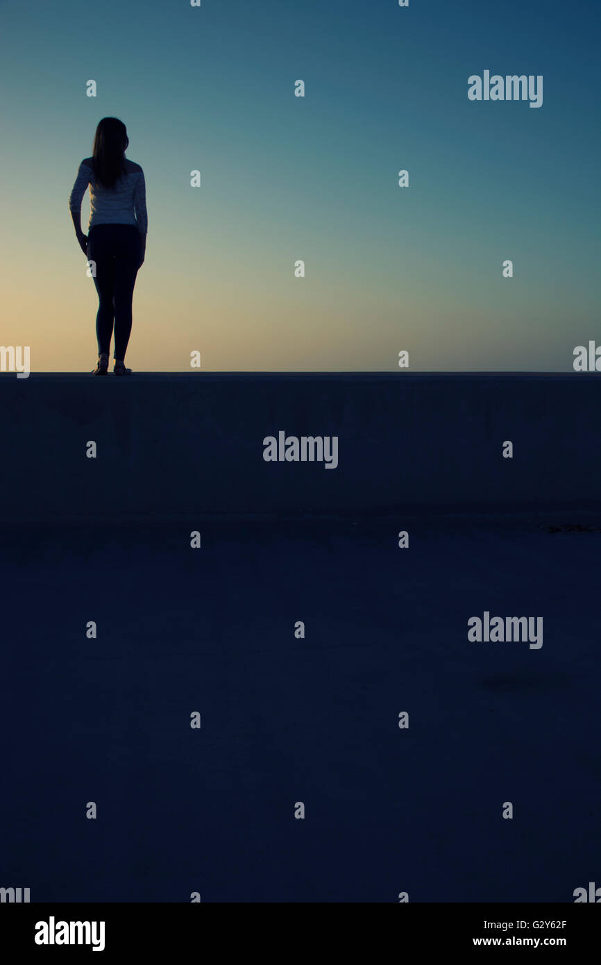 Full length female figure standing outdoors Stock Photo - Alamy