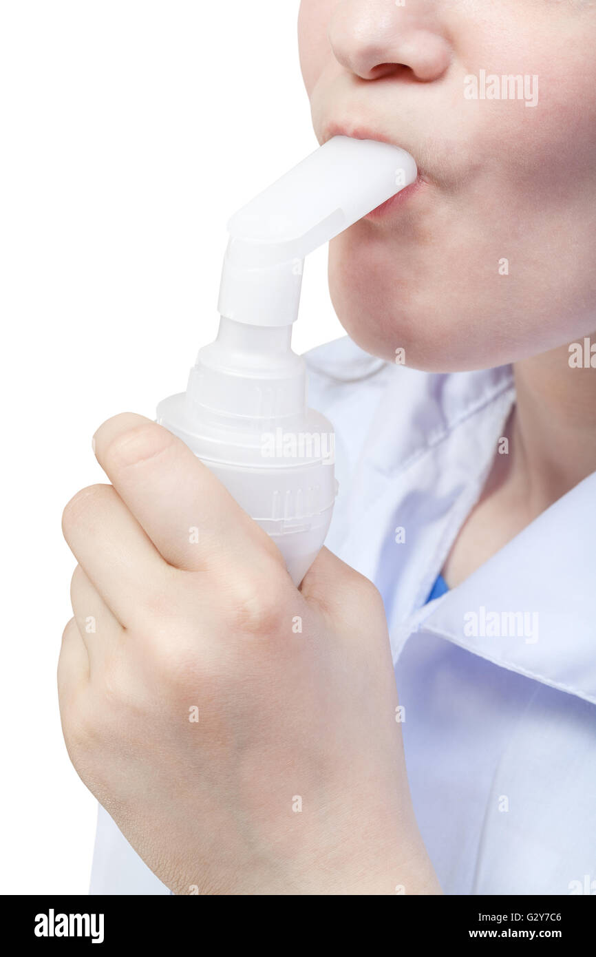 medical inhalation treatment - teen inhales with mouthpiece of jet ...