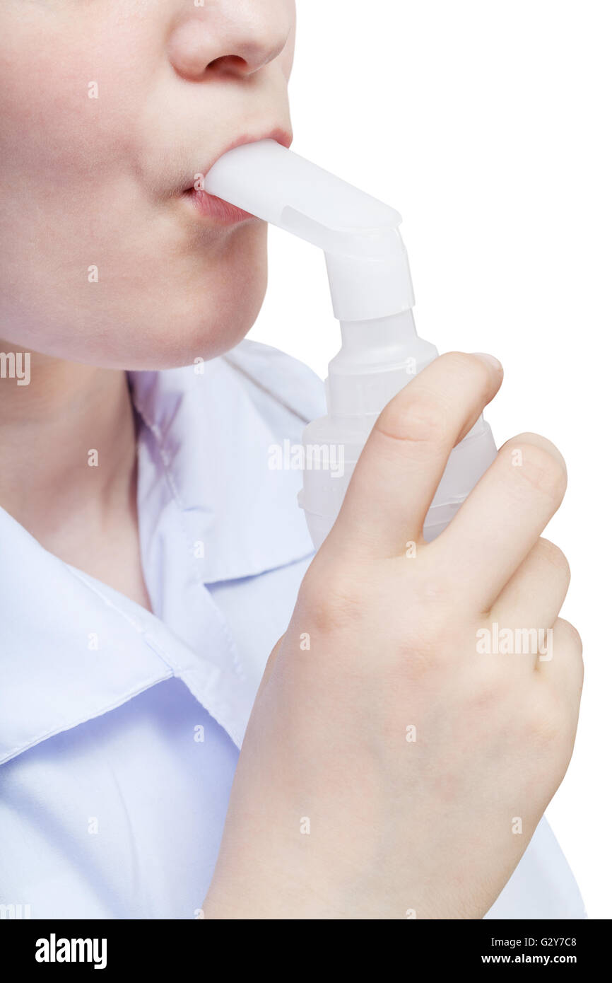 medical inhalation treatment - girl inhales with mouthpiece of jet ...