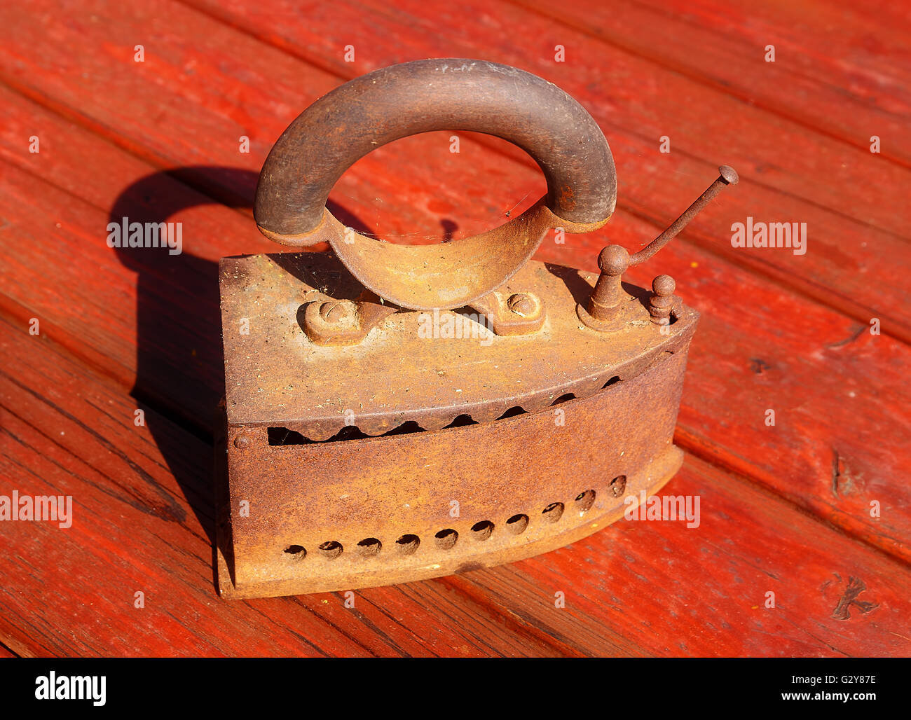 Iron on wood. ironing by using traditional coal burning heat, ancient ...