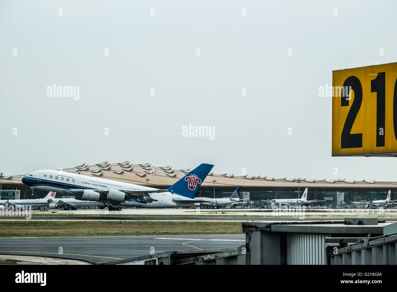 A China Airline jet taking off at Beijing Capital Airport Stock Photo ...