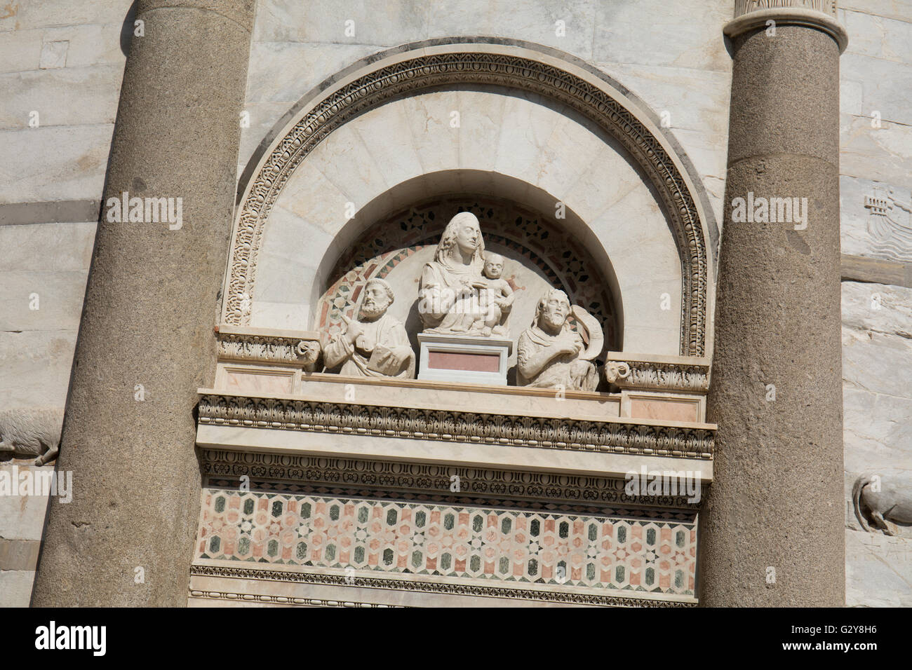 Detail of lean & sculptures over entrance to the medieval belltower of ...