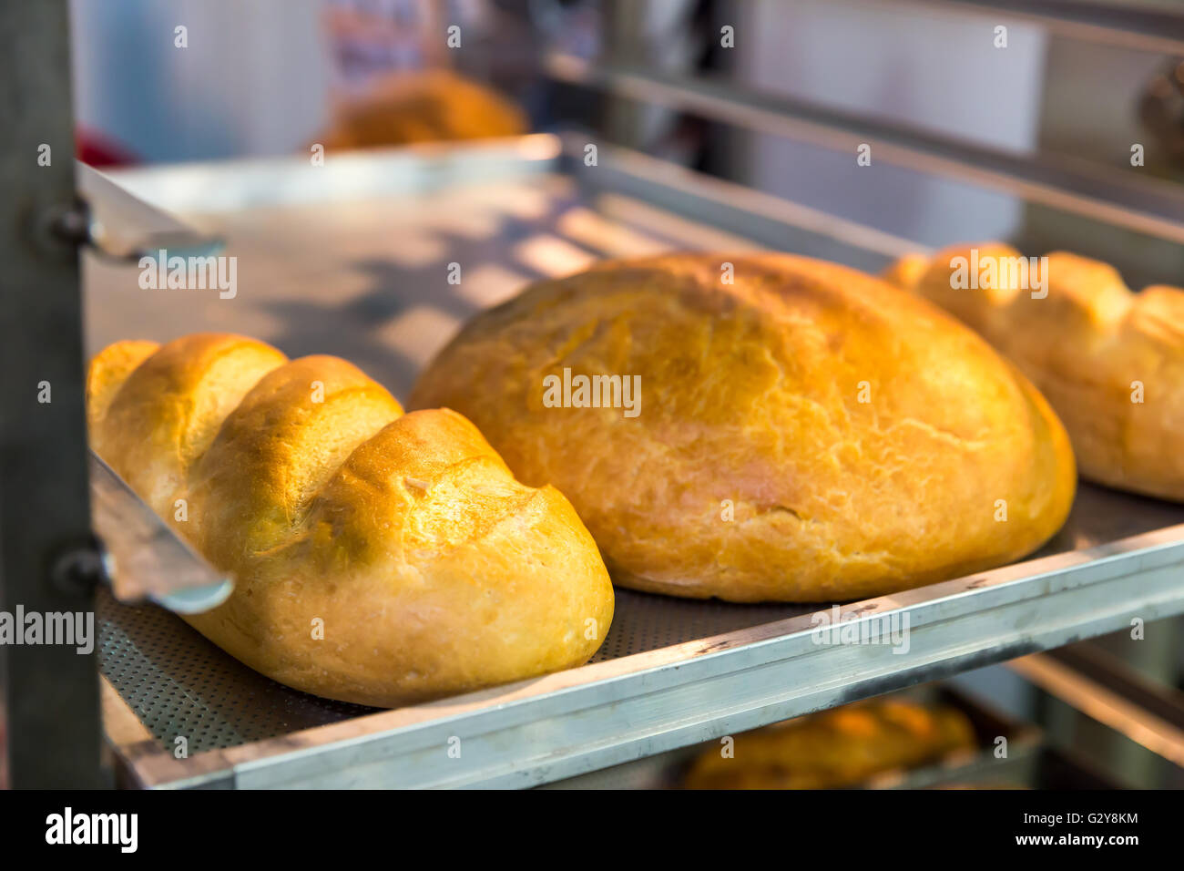 Loaves of bread on the shelf Stock Photo - Alamy