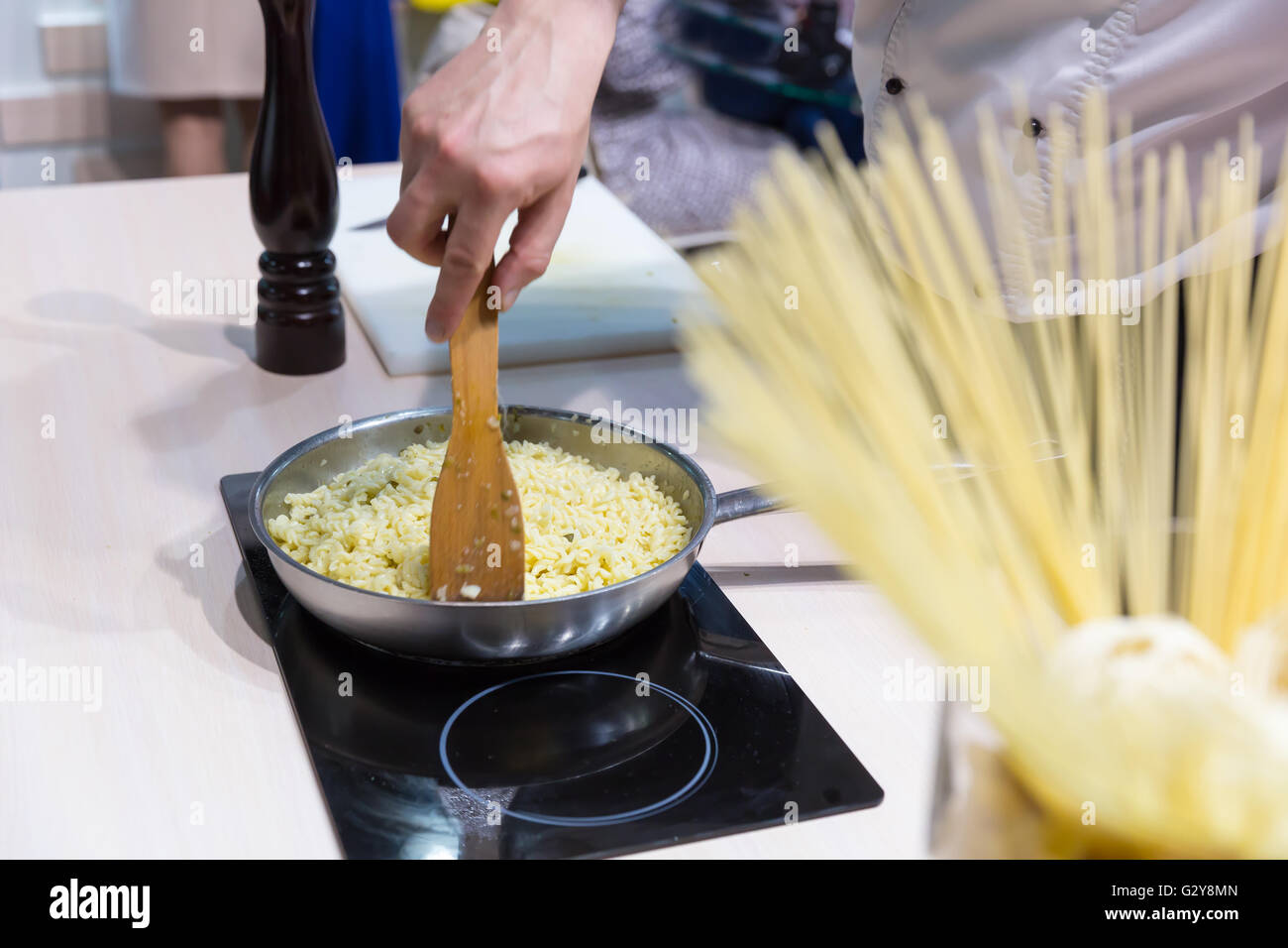 Cook cooking pasta Stock Photo - Alamy