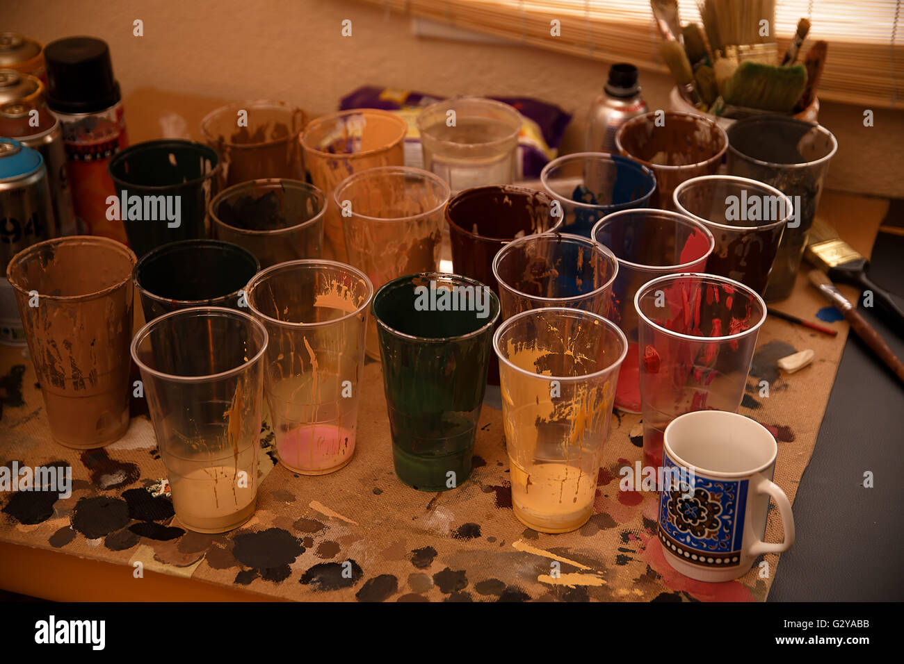 Painting atelier and clutter on the table Stock Photo - Alamy