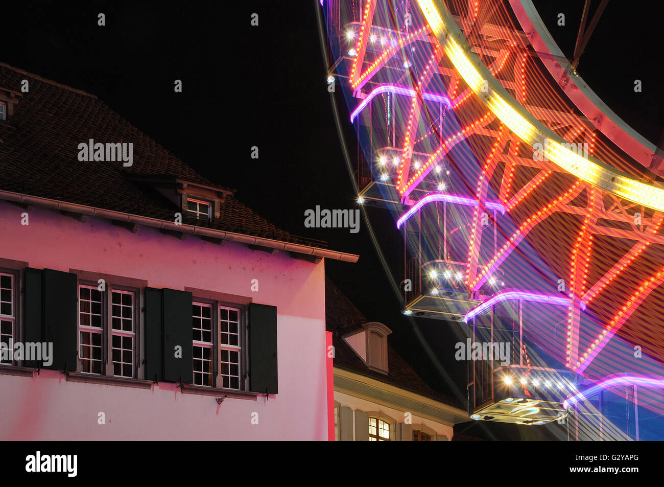 Basel Herbstmesse Ferris Wheel at night Stock Photo - Alamy
