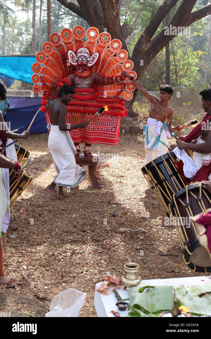 theyyam performer dances with rhythmic beats of drums Stock Photo - Alamy