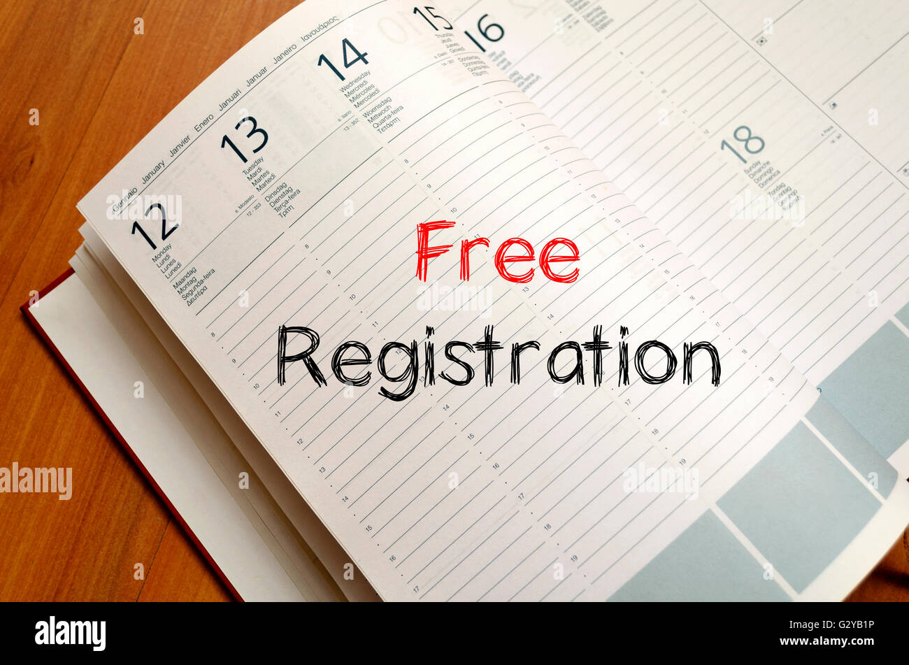 Free registration text concept write on notebook Stock Photo - Alamy