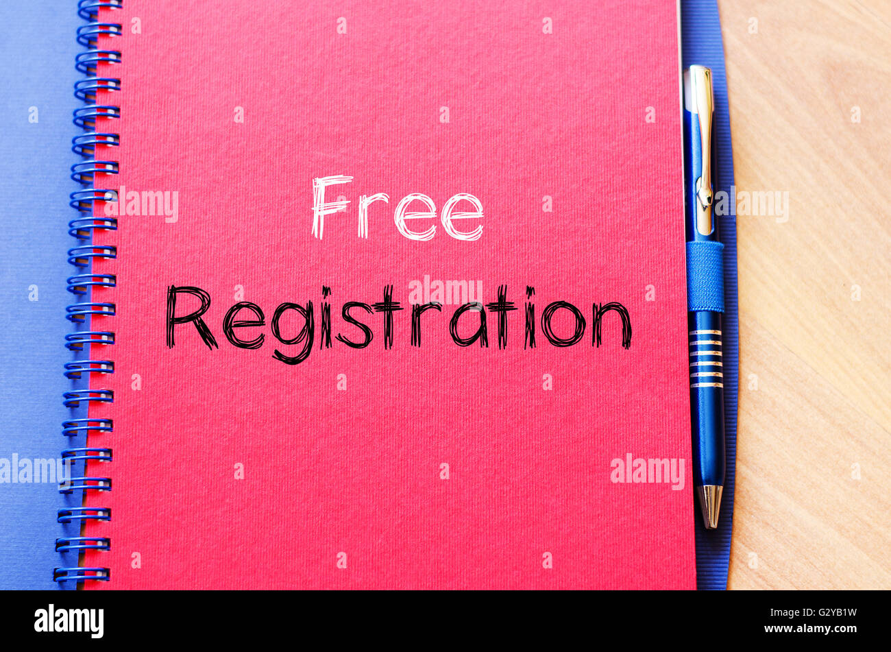Free registration text concept write on notebook Stock Photo - Alamy