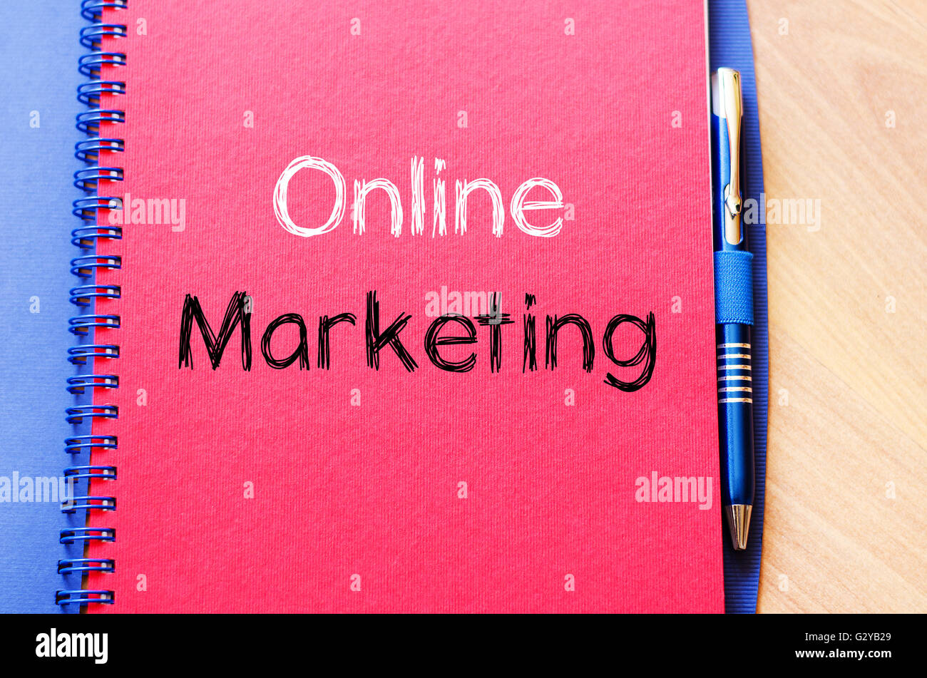 Online marketing text concept write on notebook Stock Photo - Alamy