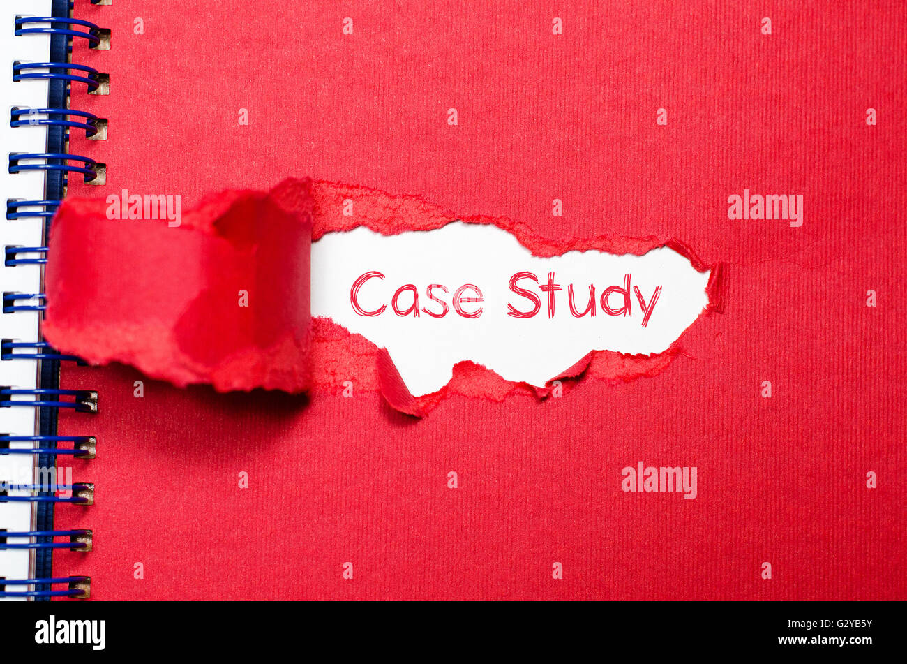 The word case study appearing behind torn paper Stock Photo - Alamy