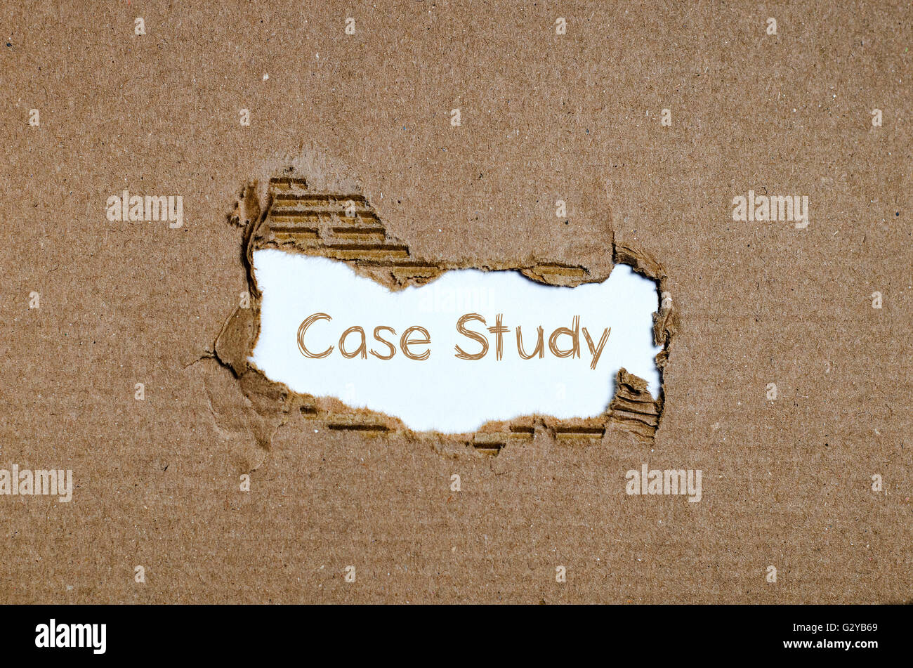 The word case study appearing behind torn paper Stock Photo - Alamy