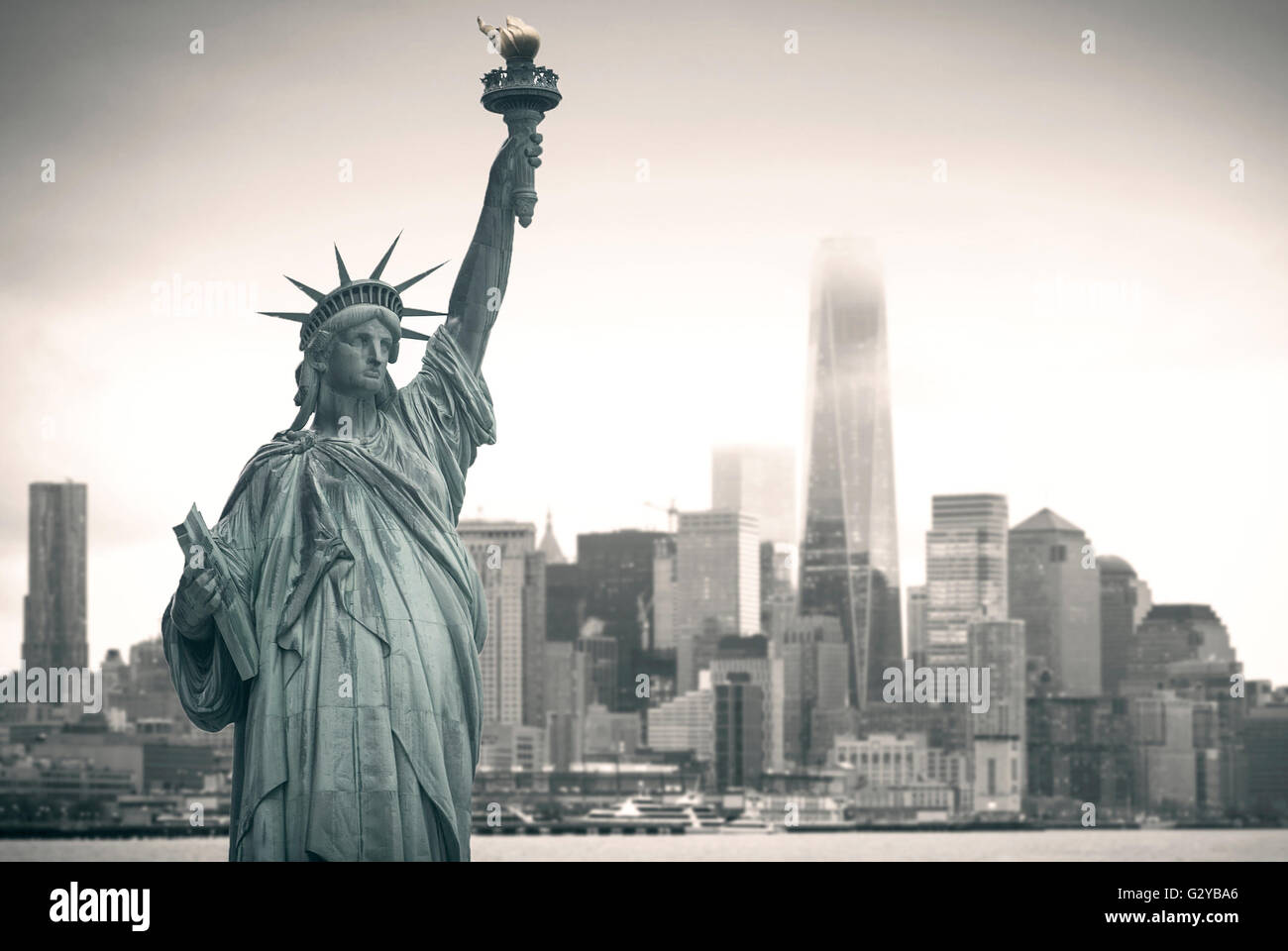 Statue of Liberty with cityscape in the background Stock Photo - Alamy