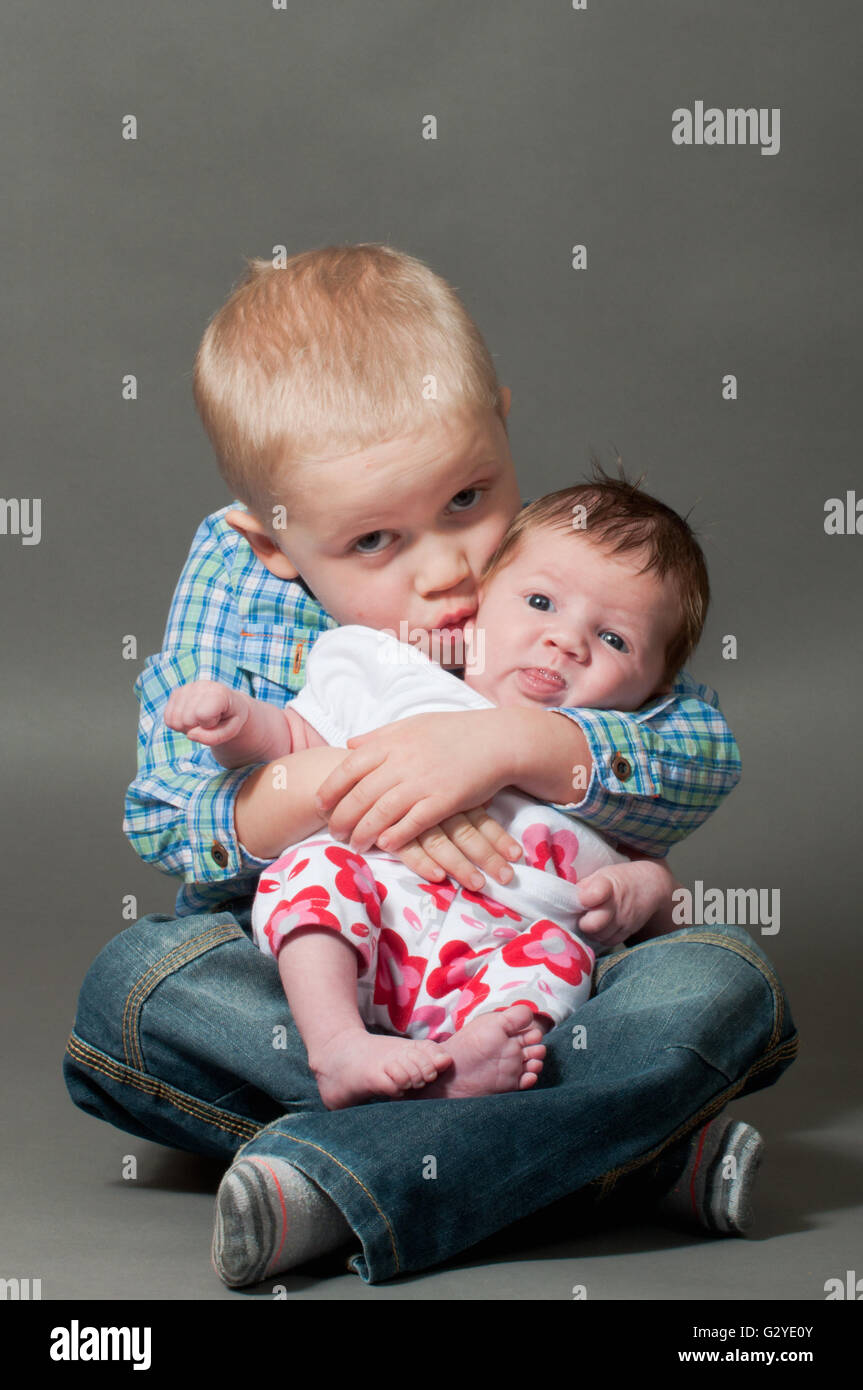 Caring for sibling hi-res stock photography and images - Alamy