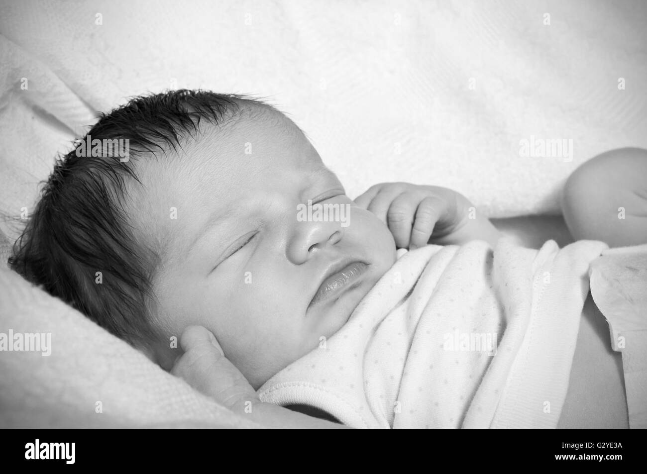 New born baby fast asleep Stock Photo - Alamy