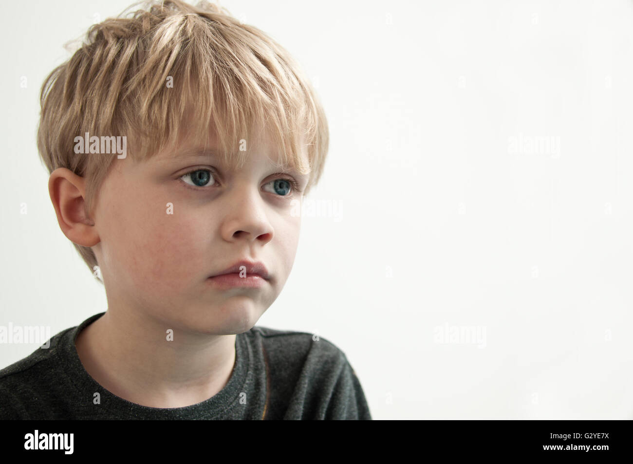Frightened boy staring Stock Photo - Alamy