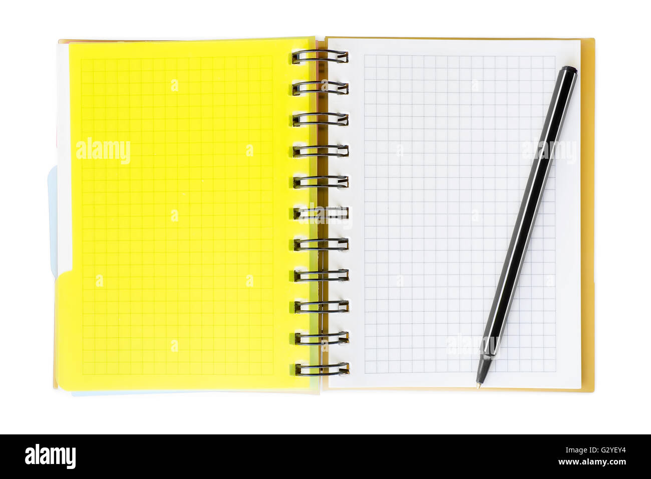Notepad with yellow plastic cover and pen on it. Isolated on white with ...