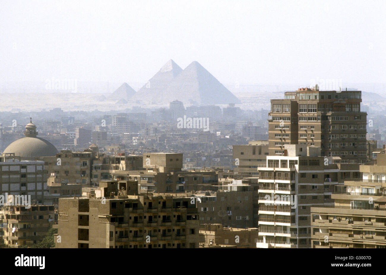 Pyramids outside the city Stock Photo - Alamy