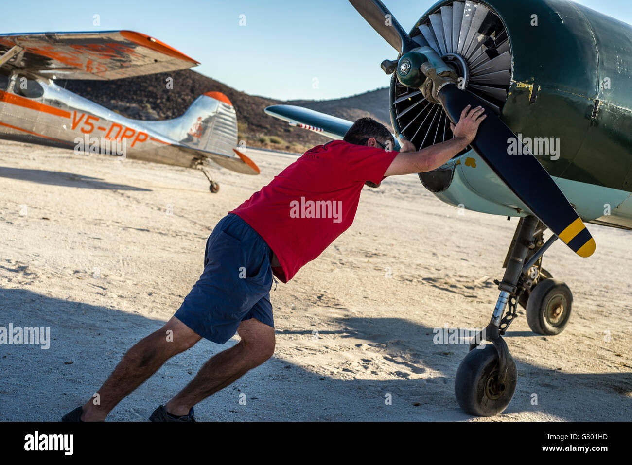 Pilots prepare their plane for flight at Fly-in competitions on ...