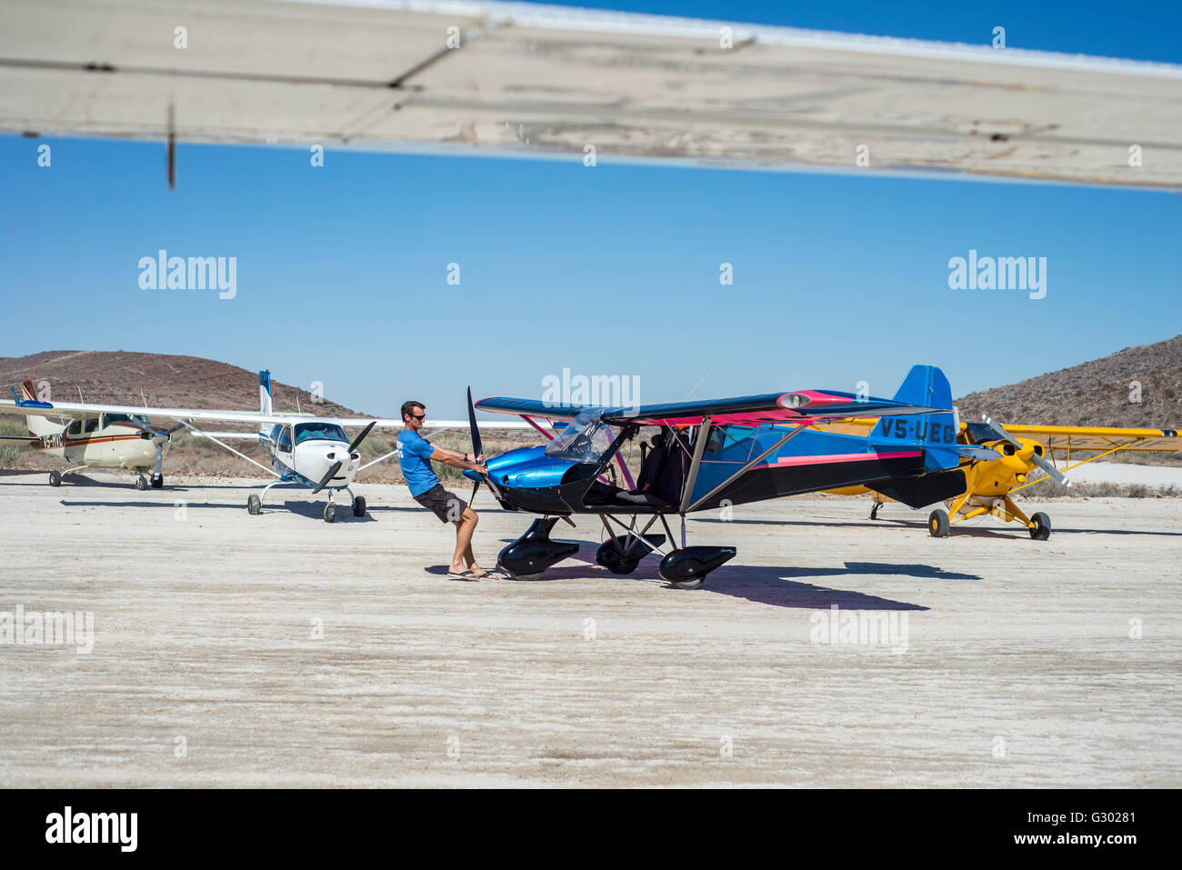 Pilots prepare their plane for flight at Fly-in competitions on ...