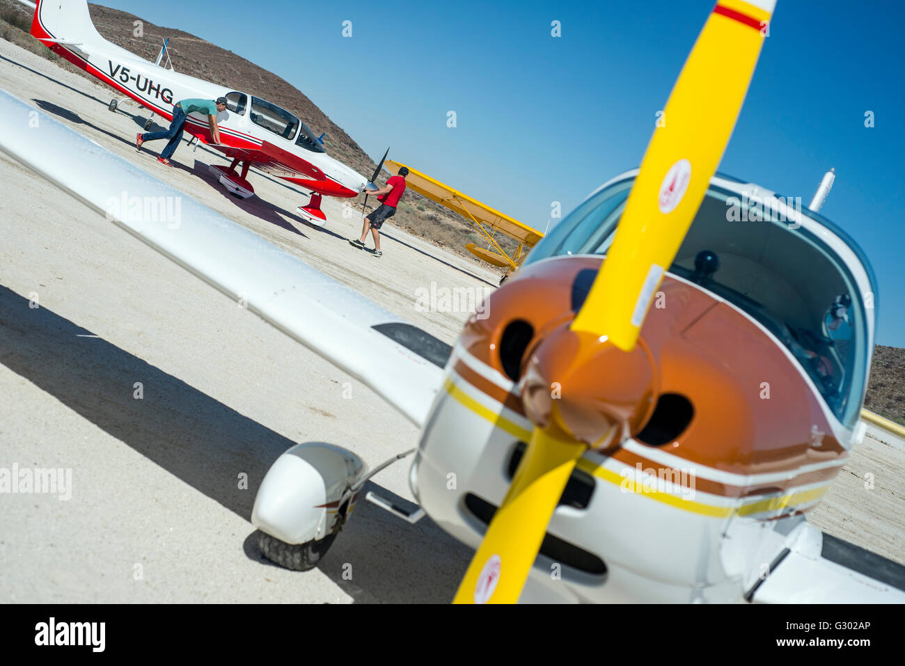 Pilots prepare their plane for flight at Fly-in competitions on ...