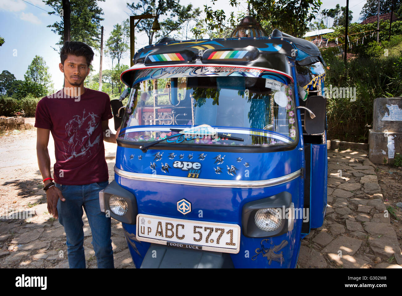 Sri Lanka, Ella, auto rickshaw driver with colourfully decorated tuktuk ...