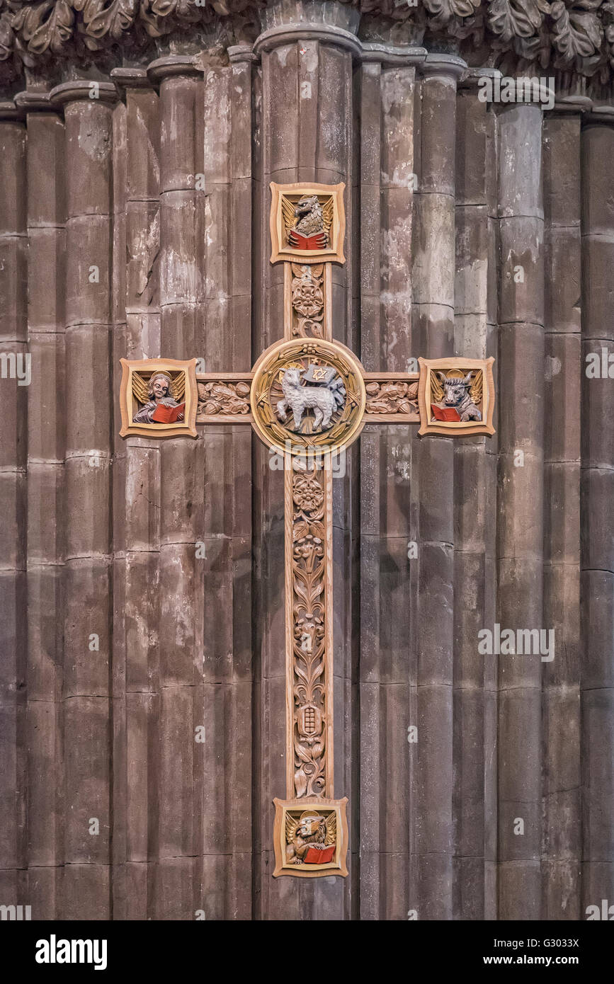 A beautifully carved wooden cross in the interior of Glasgow cathedral ...