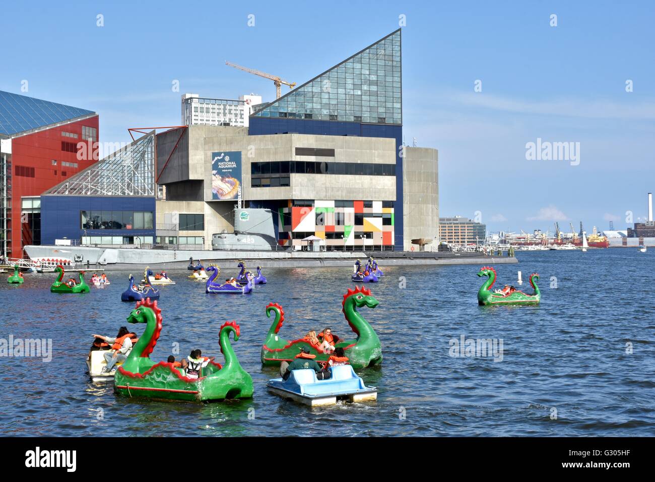 Tourists enjoying a day at the Baltimore inner harbor while taking the ...