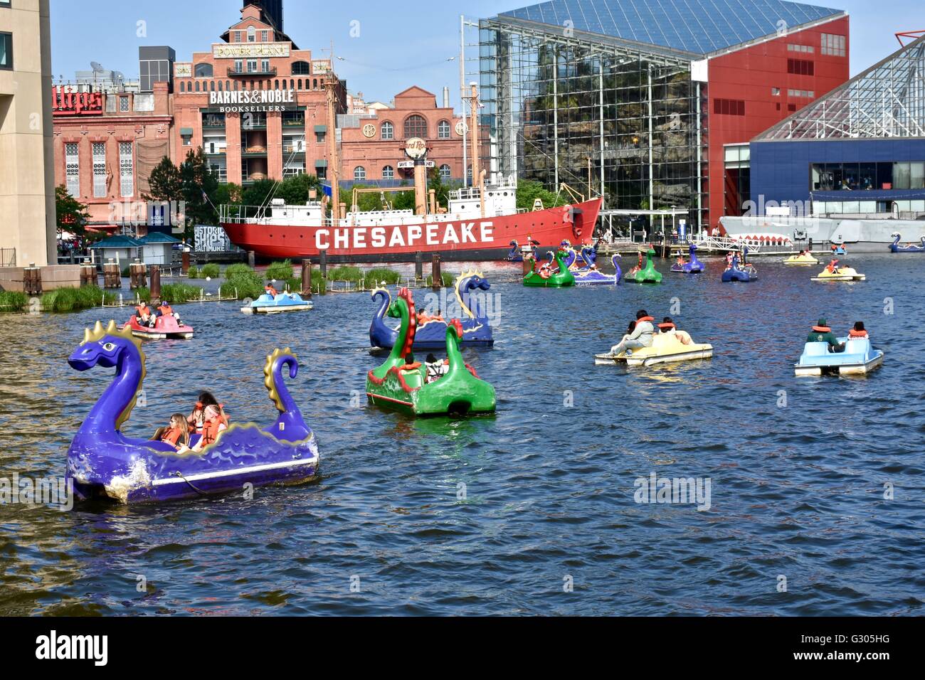 Tourists enjoying a day at the Baltimore inner harbor while taking the ...