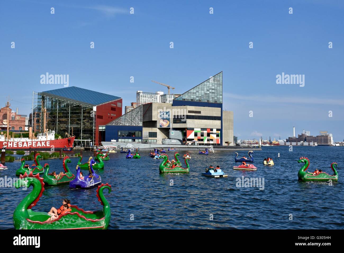 Tourists enjoying a day at the Baltimore inner harbor while taking the ...