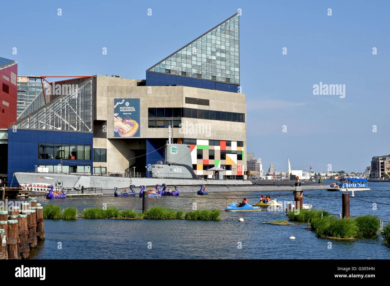Tourists enjoying a day at the Baltimore inner harbor while taking the ...