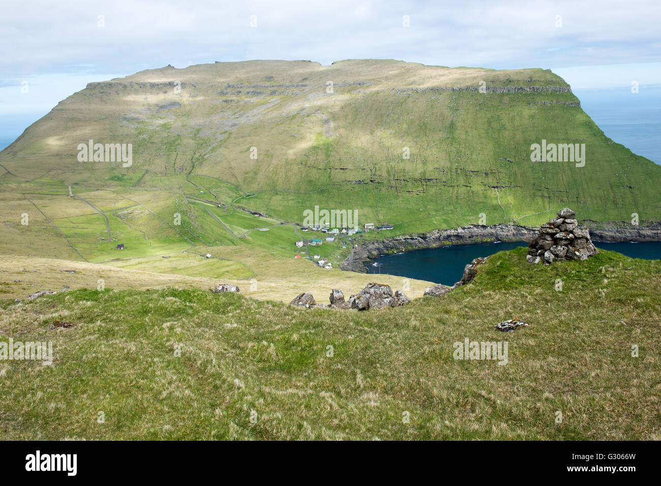 Typical Landscape On The Faroe Islands With The Village Hattarvik