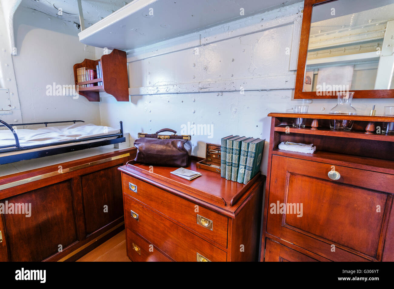 Patient notes and a medical bag on a desk in a doctor's surgery on a ...
