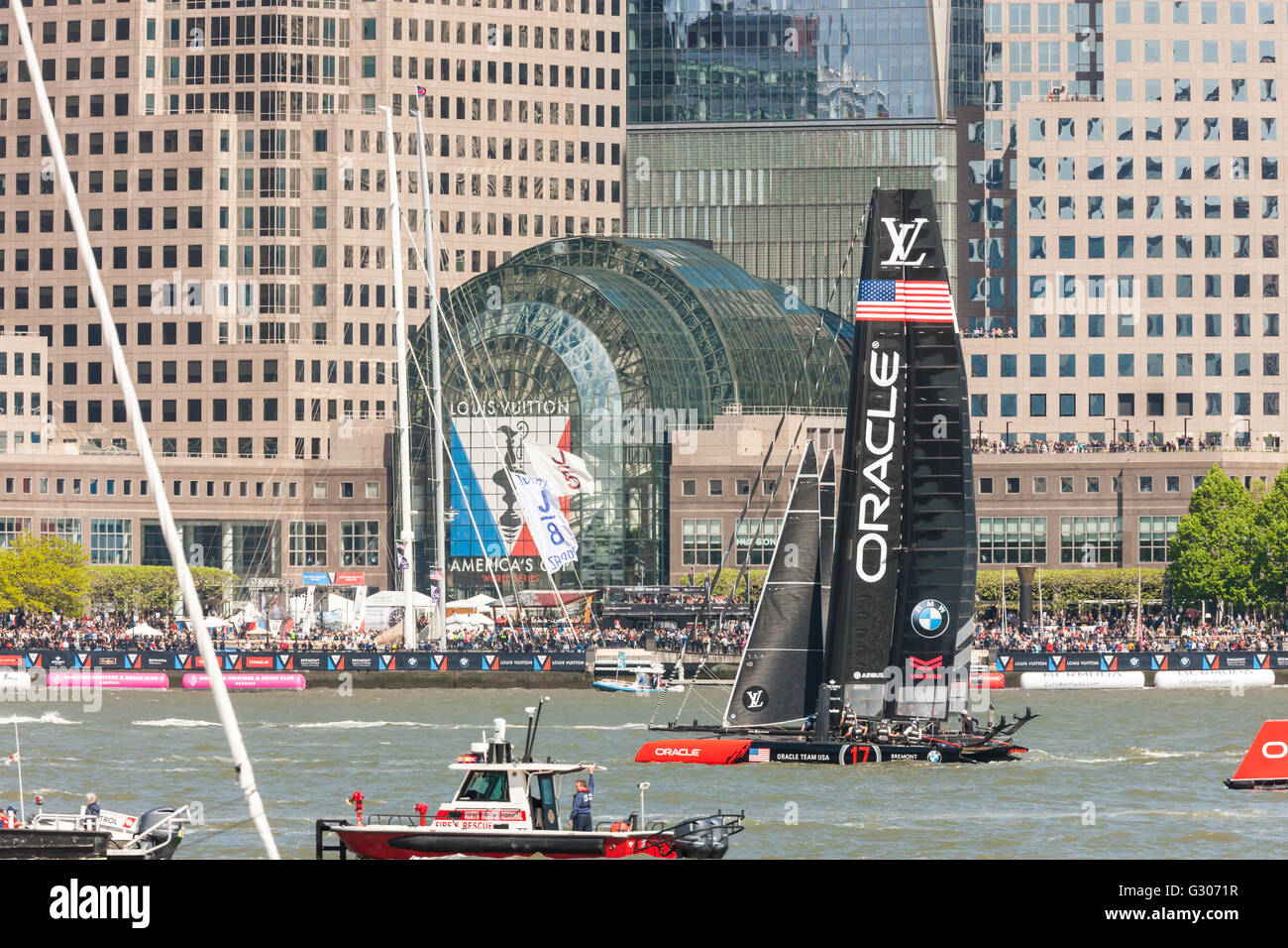 The Oracle Team USA catamaran races on the Hudson River near Brookfield ...