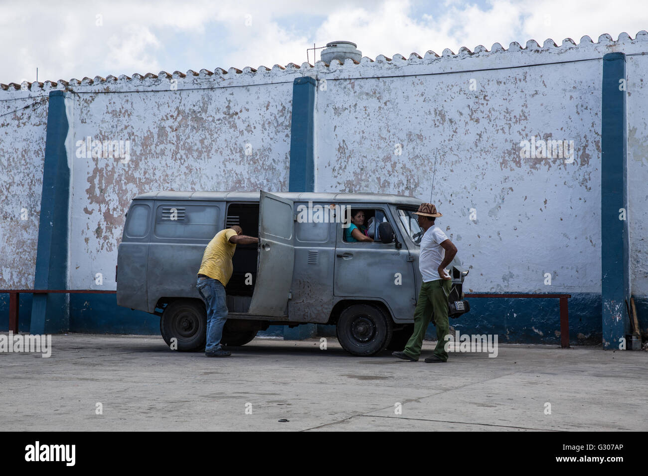Group of Cubans in old van in Trinidad, Cuba Stock Photo - Alamy
