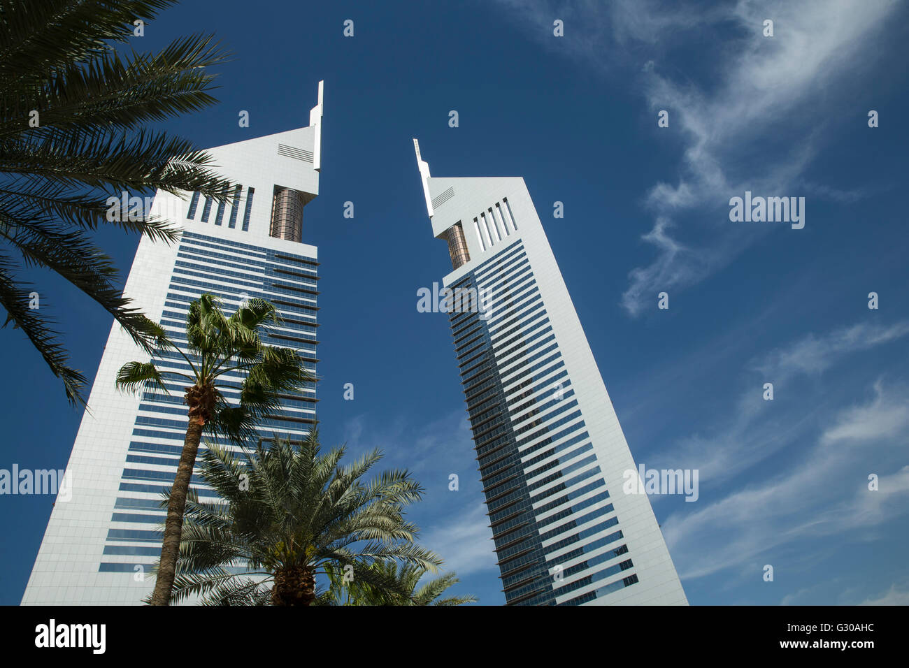 Emirates towers through palm trees hi-res stock photography and images ...