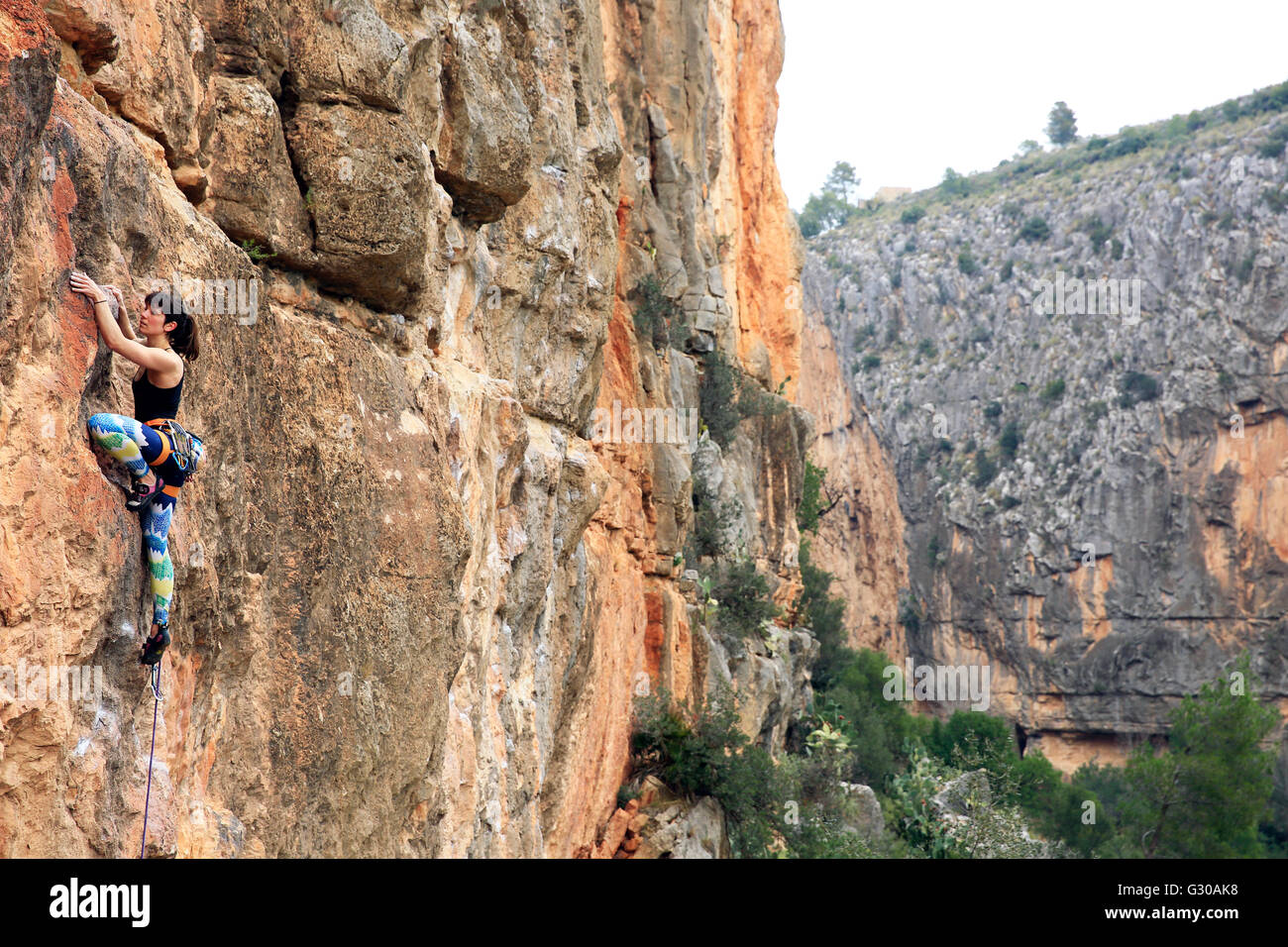 A climber scales cliffs at Chulilla, Valencia, Spain, Europe Stock ...