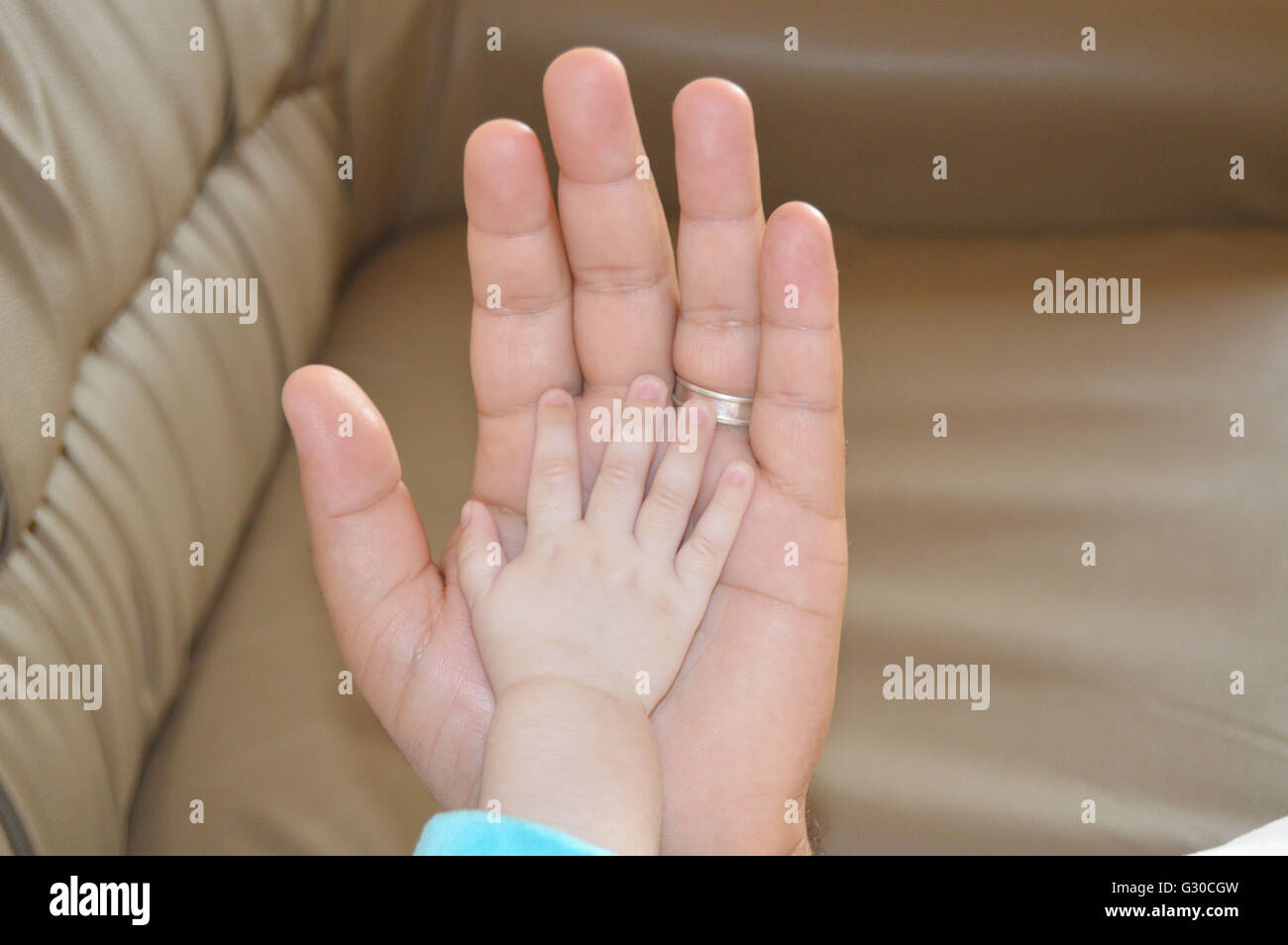 Hand father and baby hi-res stock photography and images - Alamy