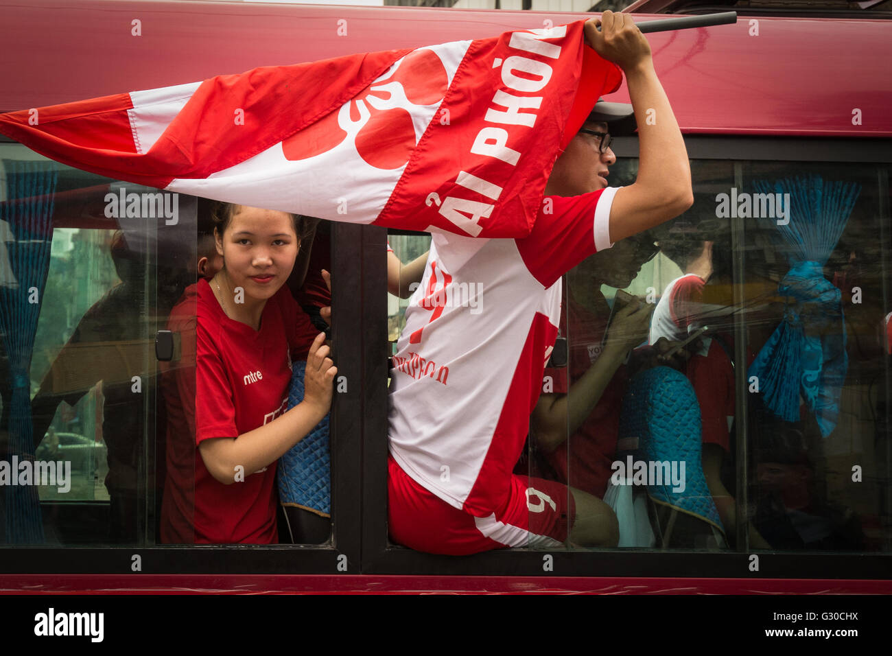 Football fans on a bus en route to a game in Hanoi, Vietnam Stock Photo ...